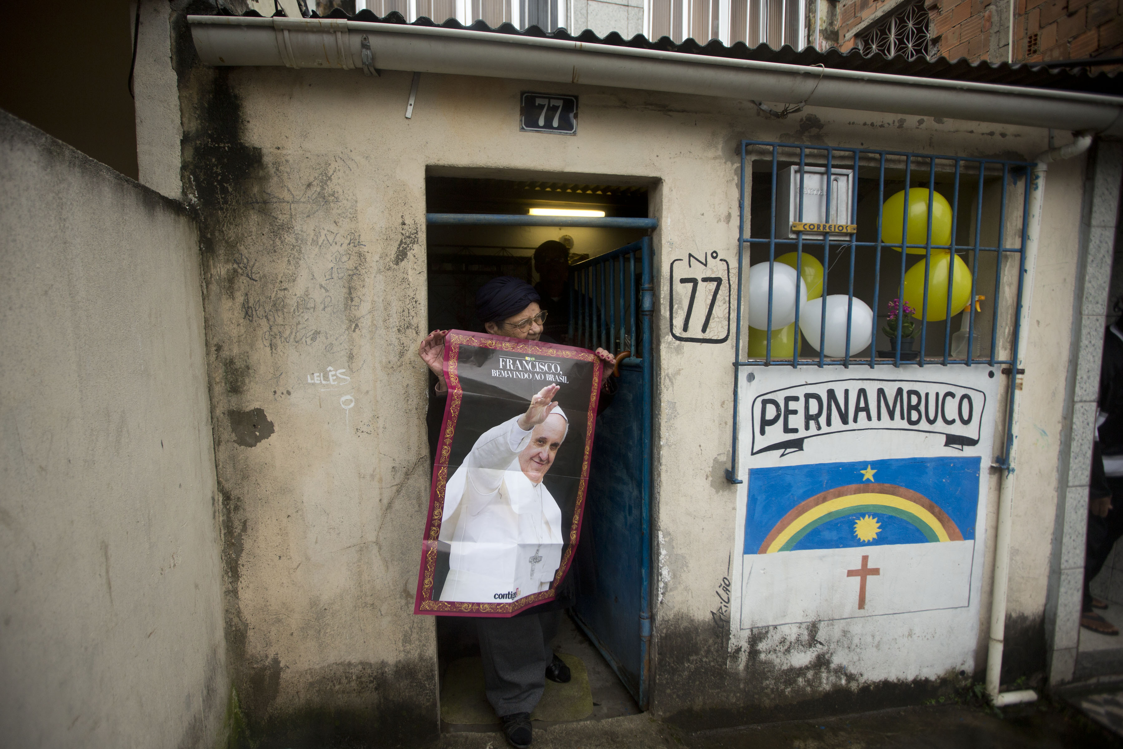 Pope calls for social justice in visit to Rio slum