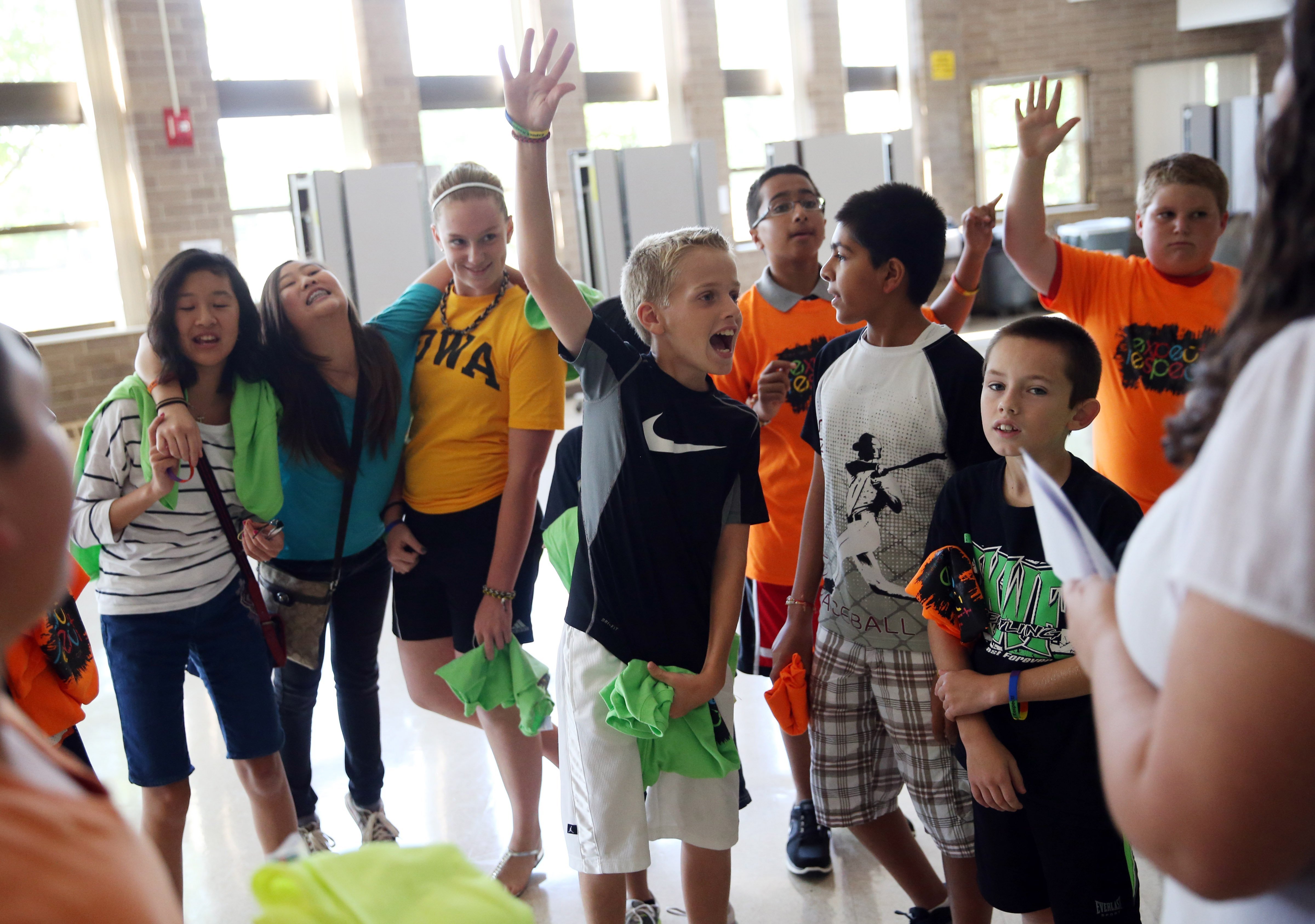 Stopping school bullying with orange T-shirts and a music video