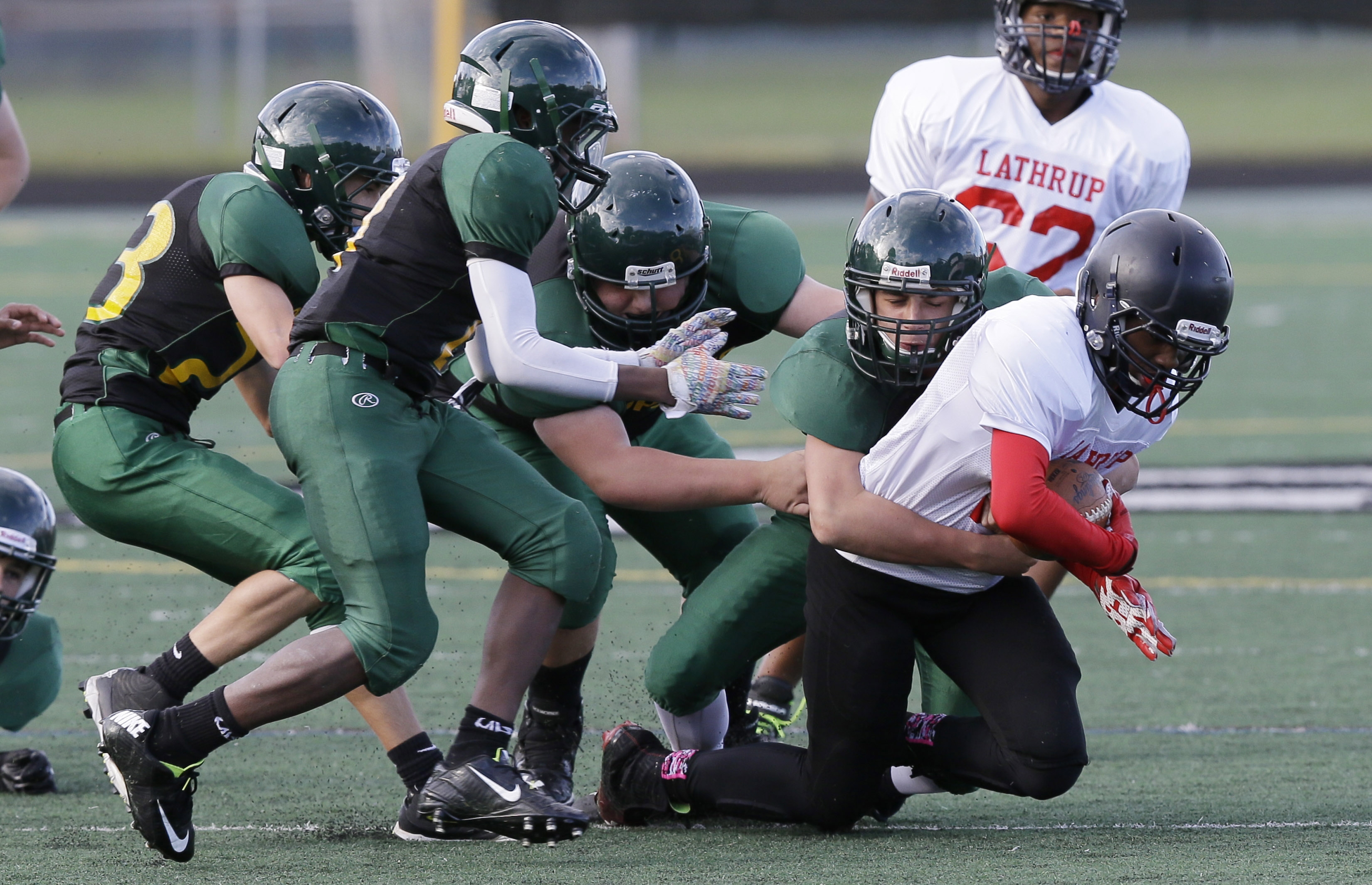 Michigan athletic group says concussion program works