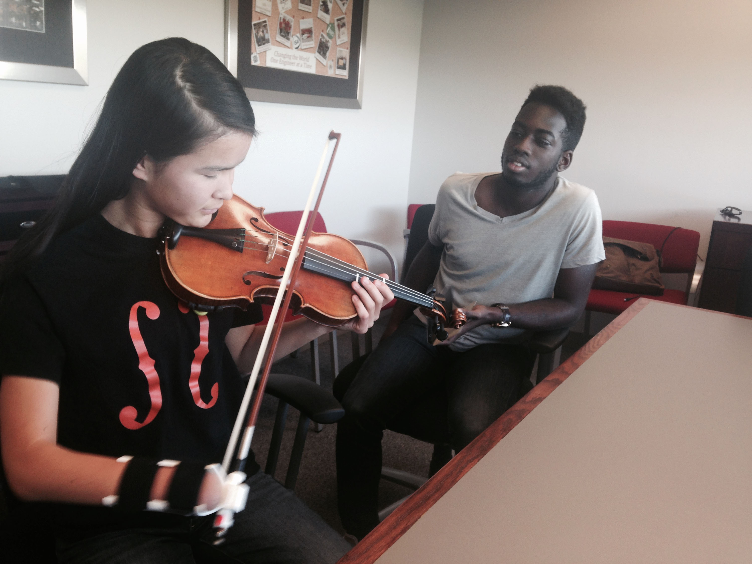 Student creates prosthetic so girl born without hand can master the violin