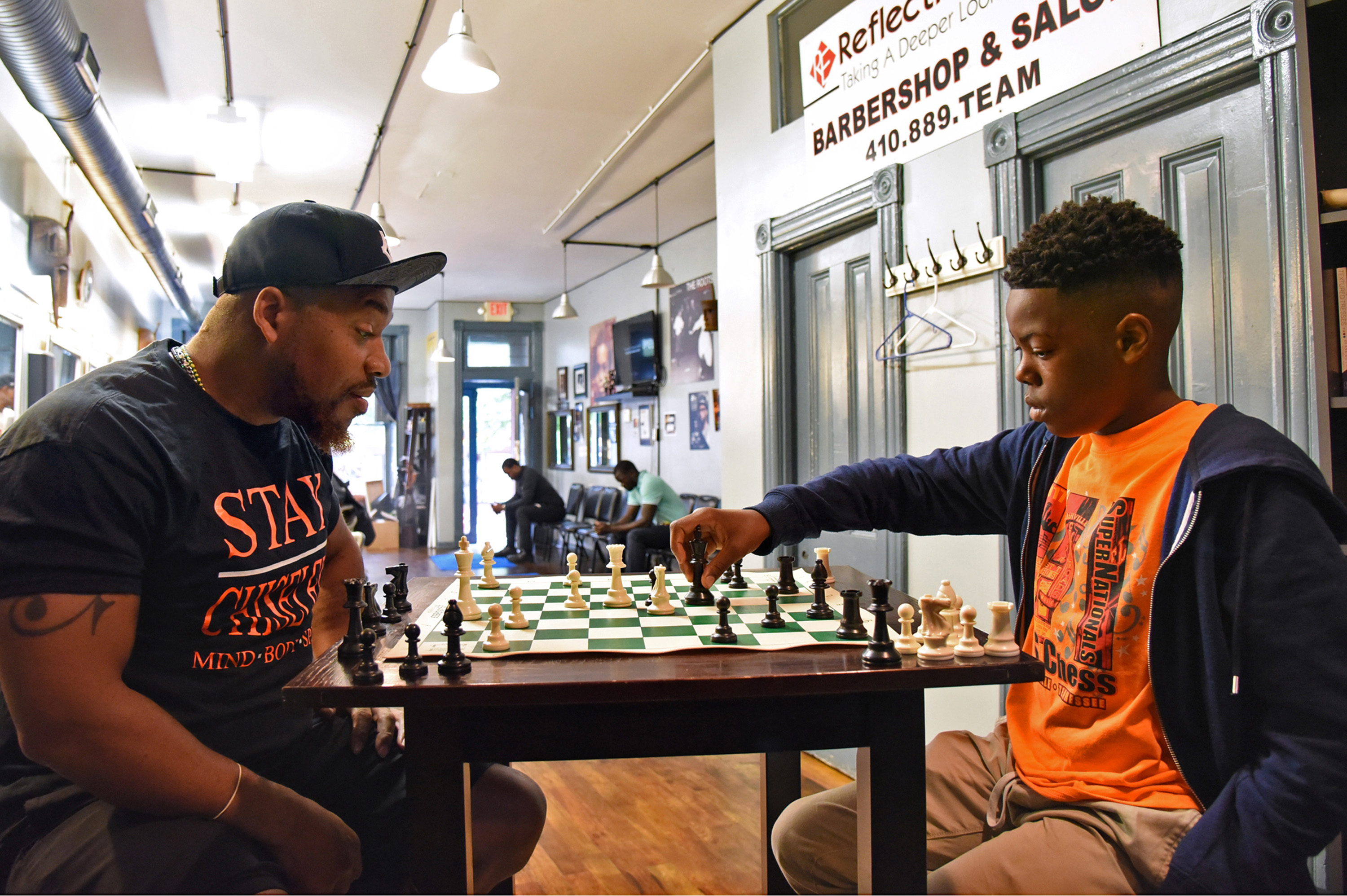 Tested in a barbershop, seventh-grader becomes national chess champion