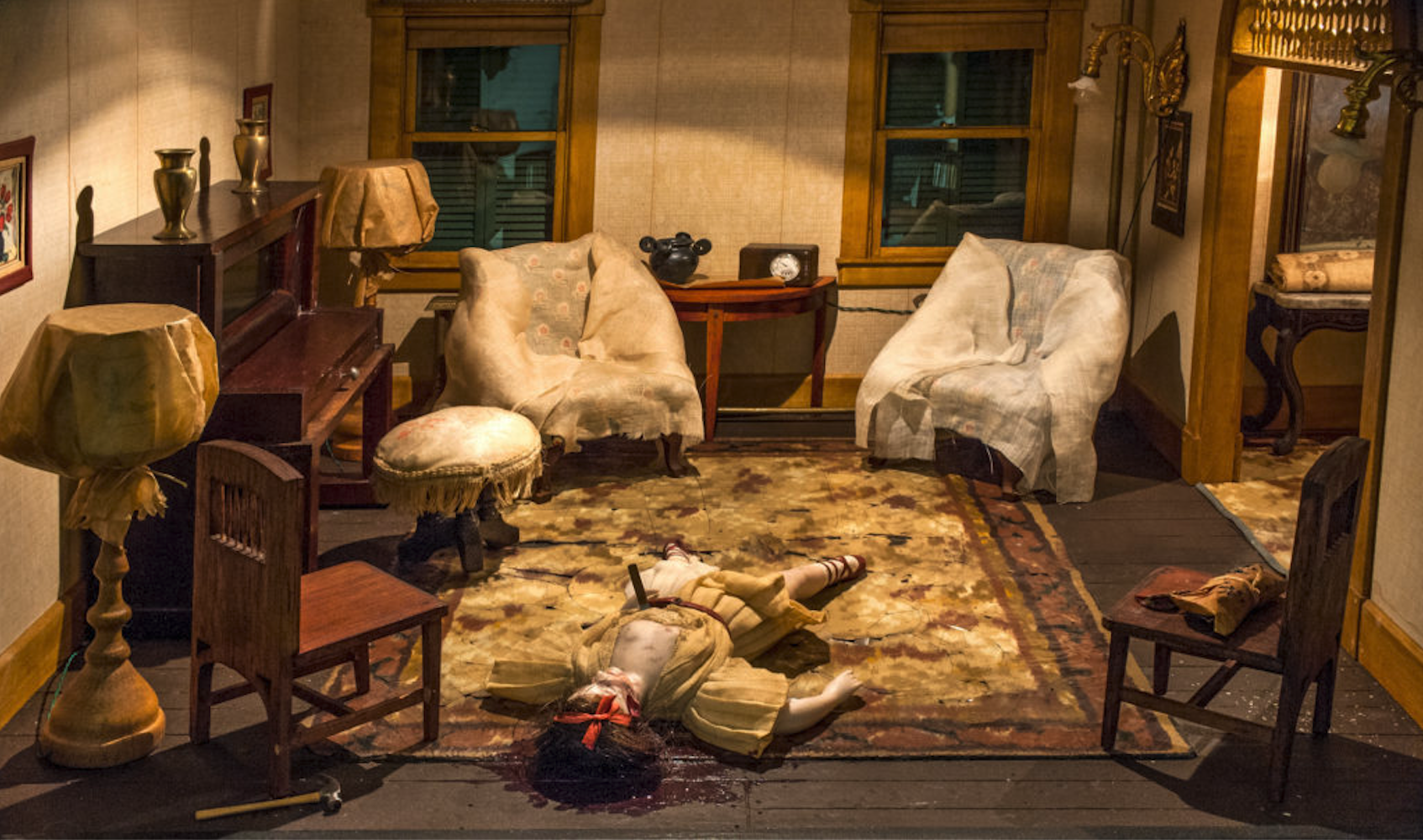 Spot the clues: Dollhouse models of murder mysteries challenge visitors