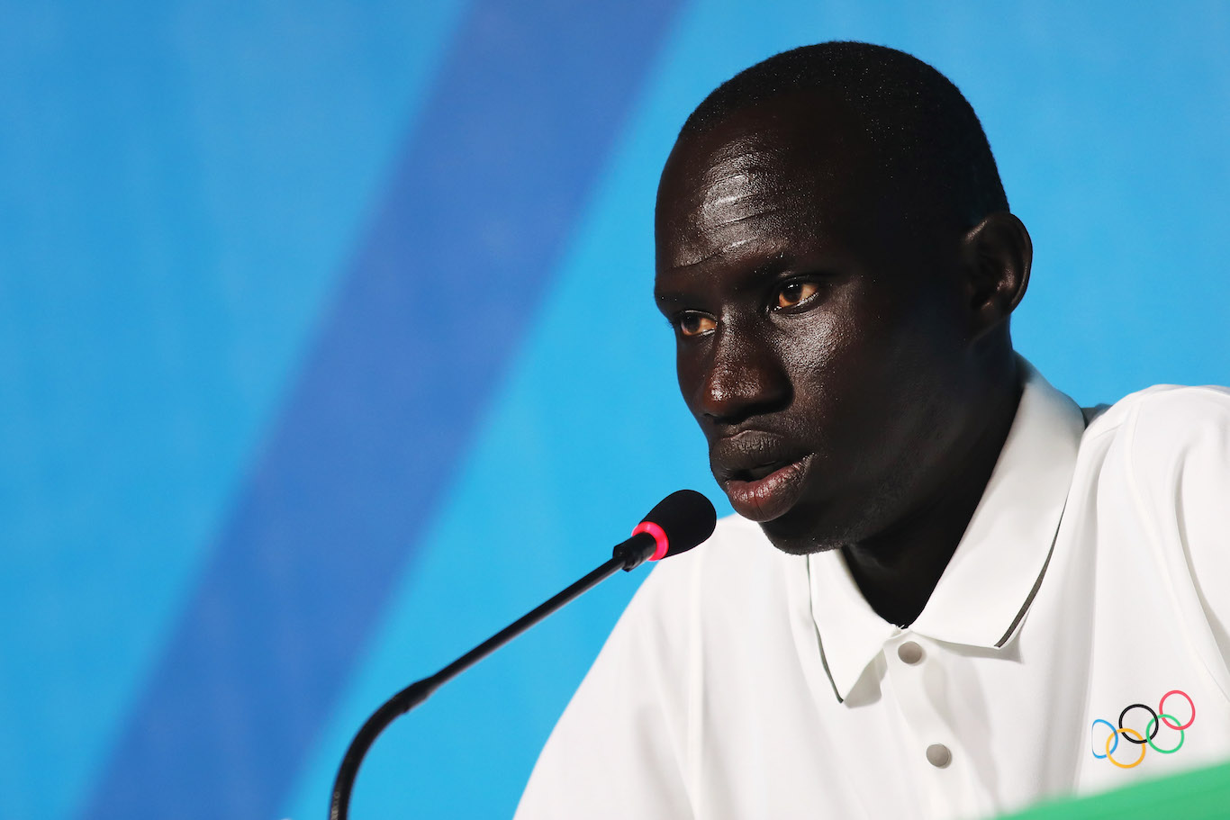"You can change the world": Olympic runner helps other refugees