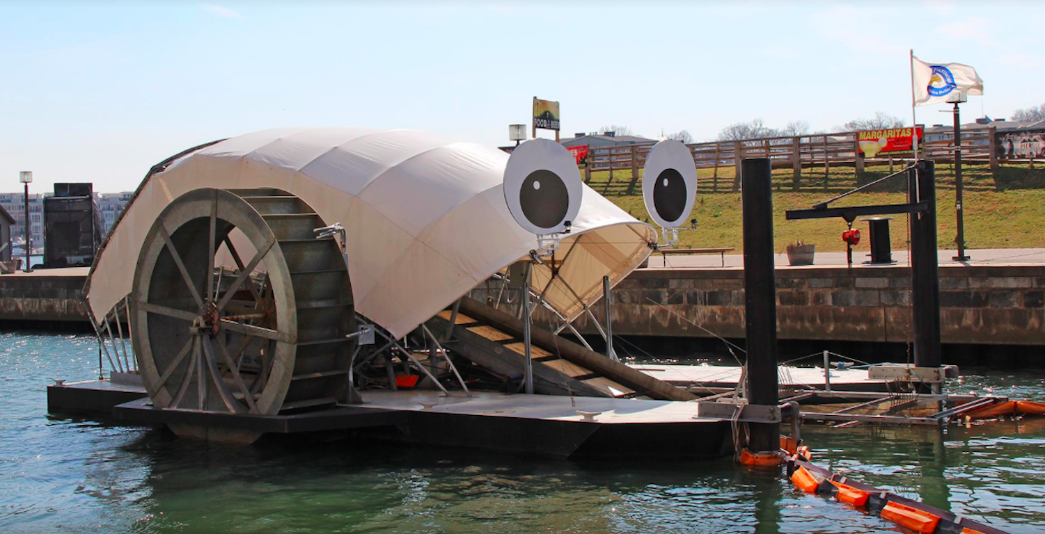 Trash-scooping water wheel keeps Baltimore waterfront clean