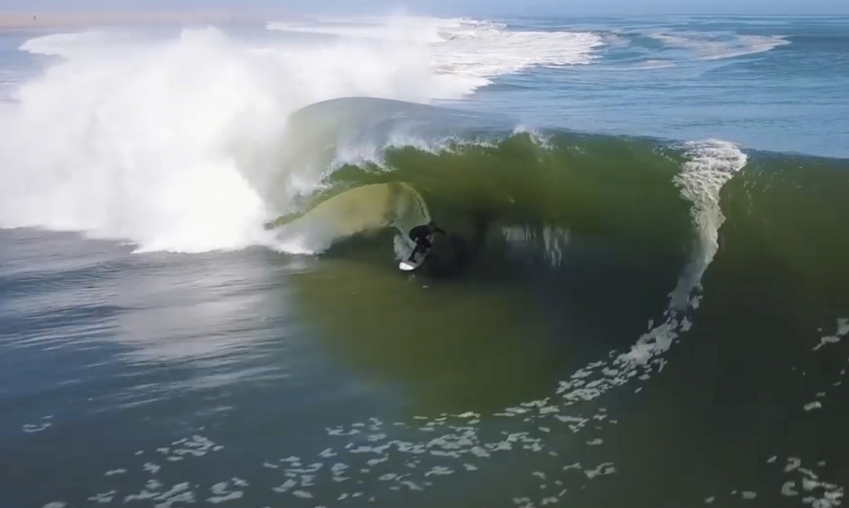 Surfer rides history-making wave in Namibia