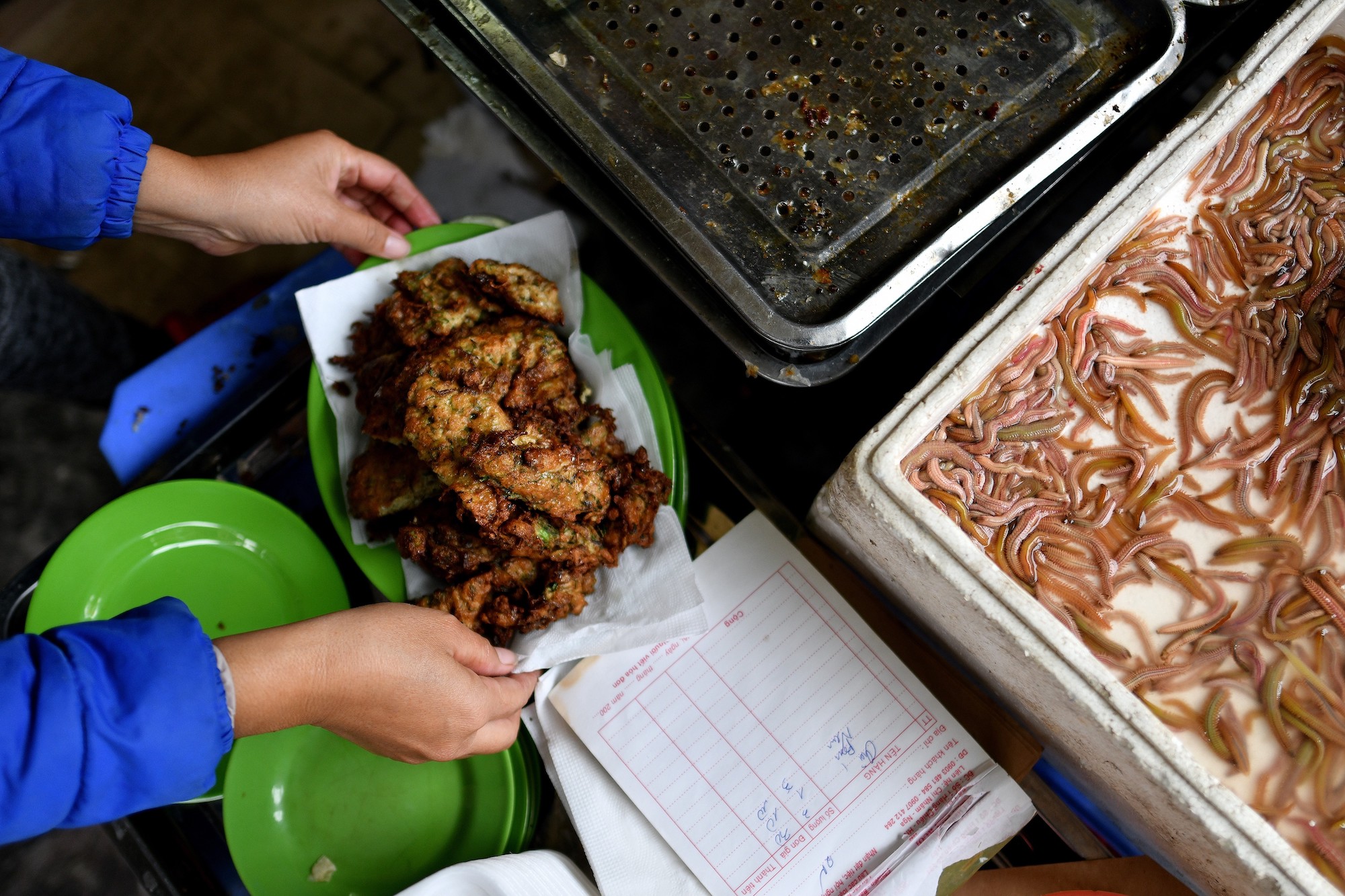 Ragworm fritters are on the menu in Hanoi in winter, and locals love them