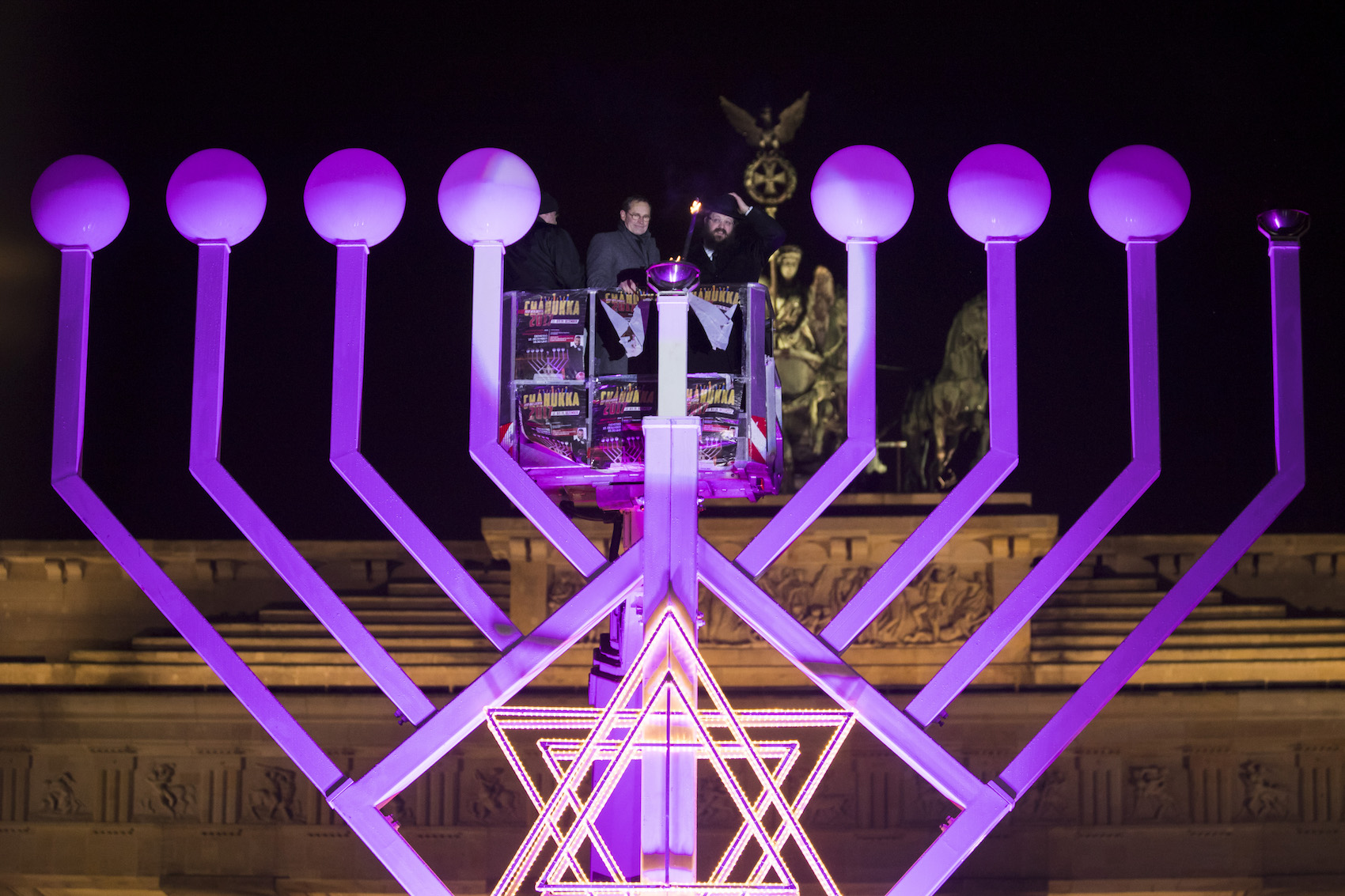 Menorahs are moving back outdoors to celebrate Hanukkah's traditions