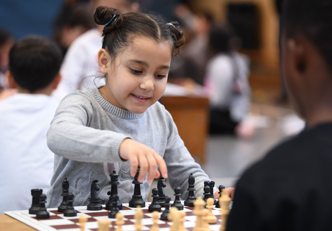 Exciting day: Second- and third-grade chess players get to meet their hero