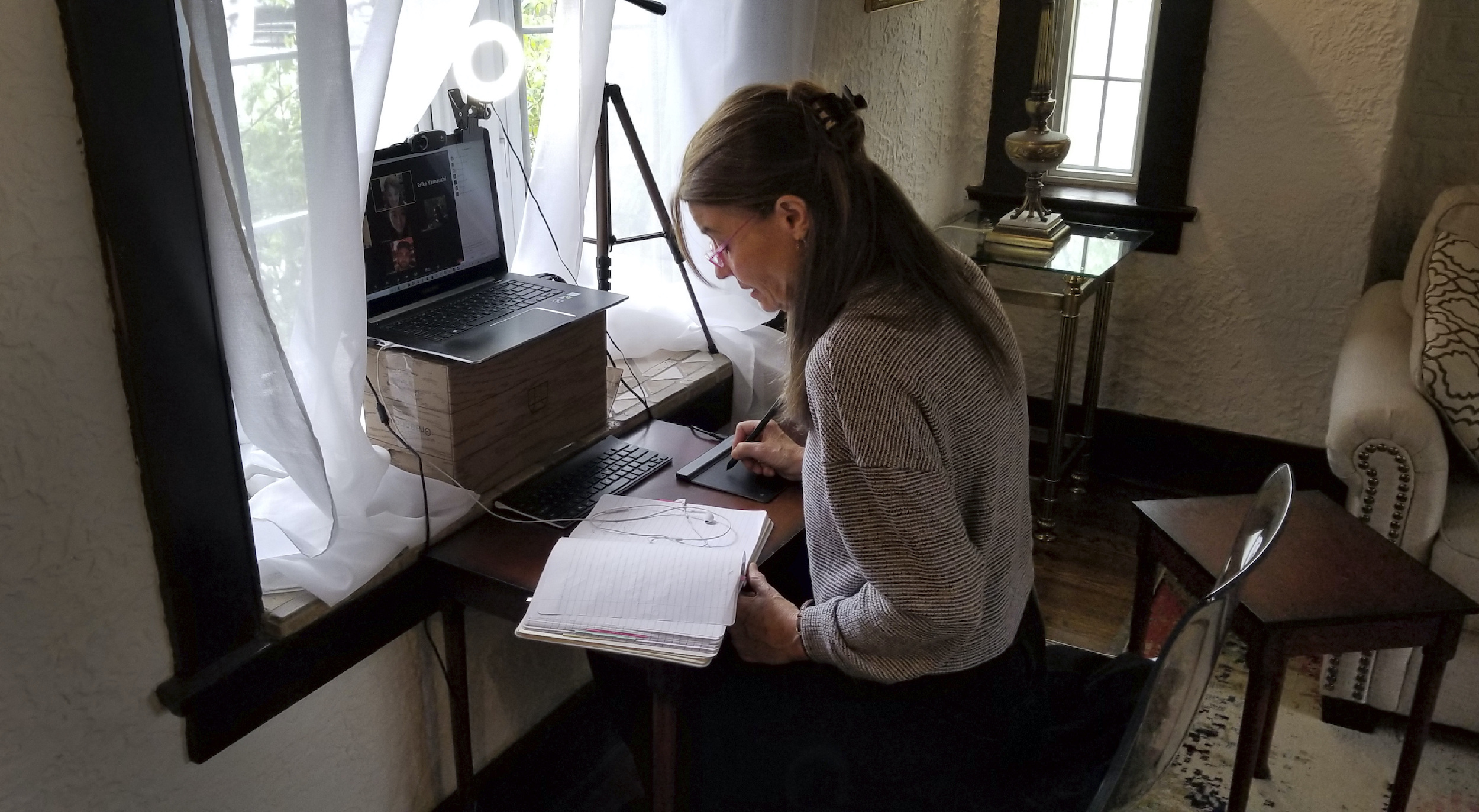 Professor overcomes loss to craft COVID-19 student brochures